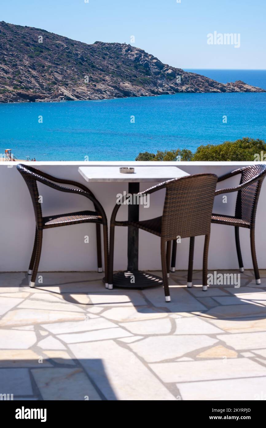 Amazing view from a balcony with chairs and a table overlooking the ...