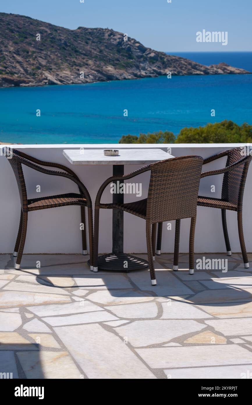 Amazing view from a balcony with chairs and a table overlooking the ...