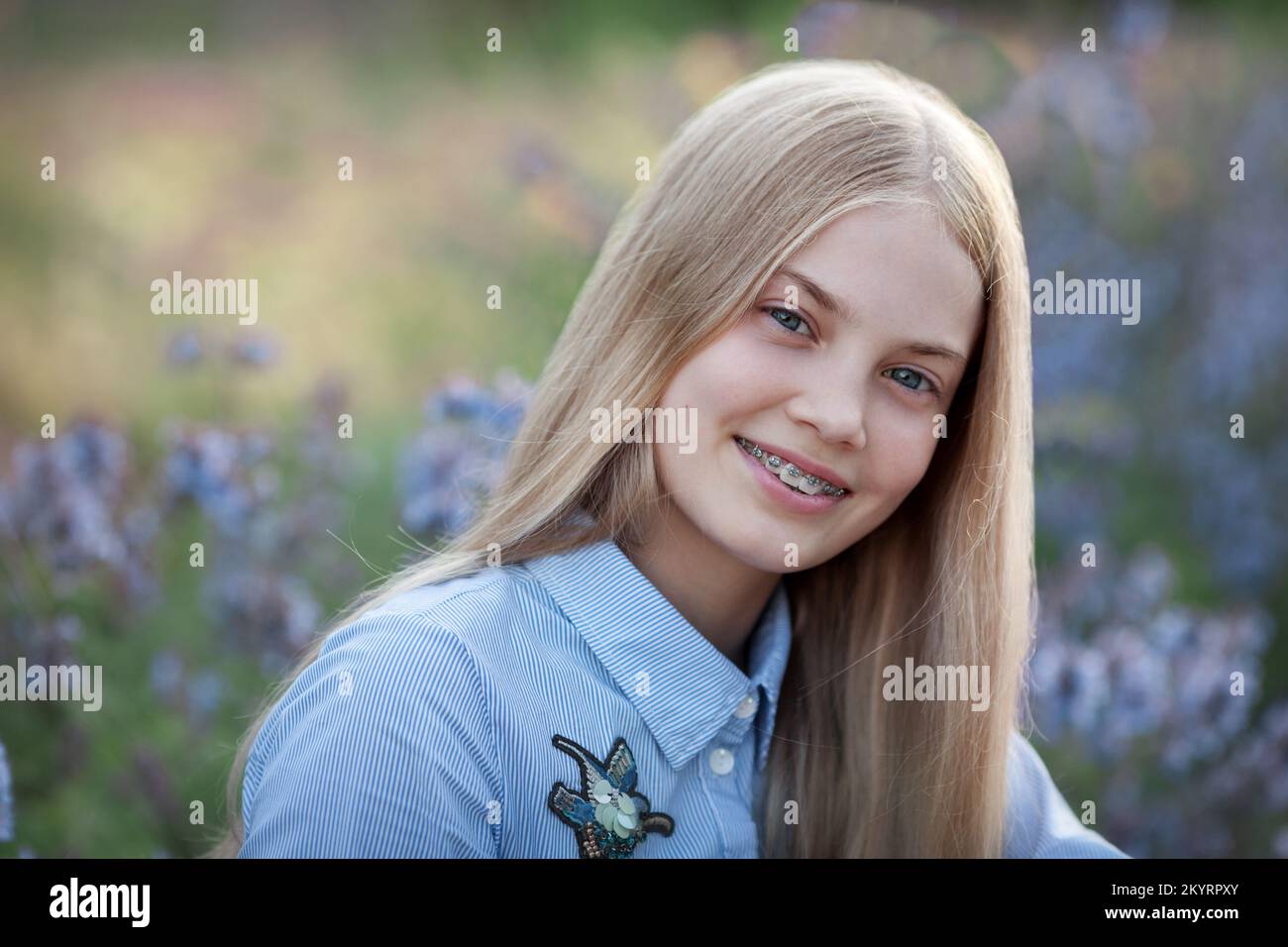 beautiful teen girl with braces on her teeth smiling. portrait of ...
