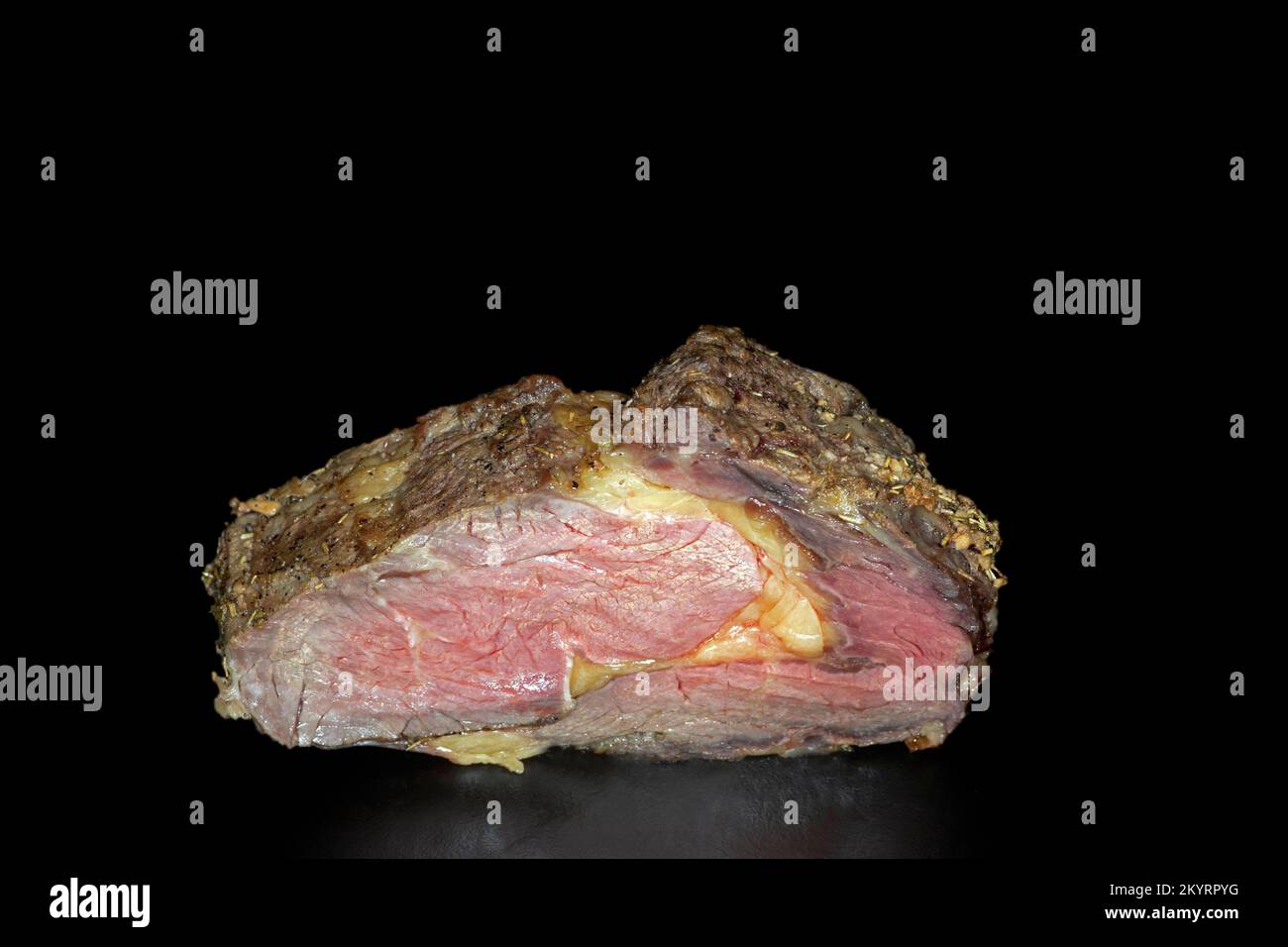 Medium roasted entrecôte, food photography with black background Stock ...