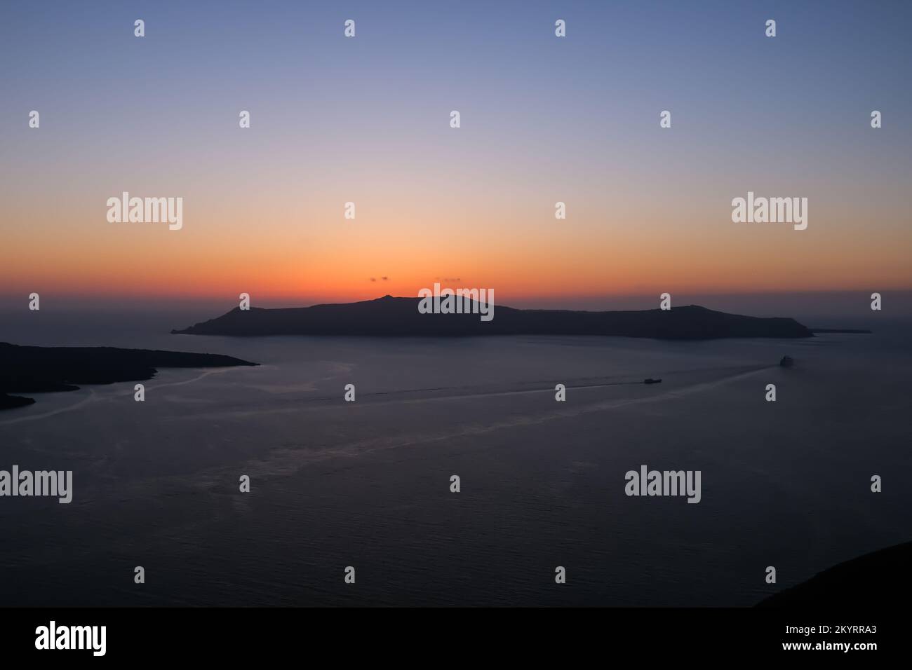 Spectacular sunset view from the rooftops of Fira Santorini Stock Photo ...