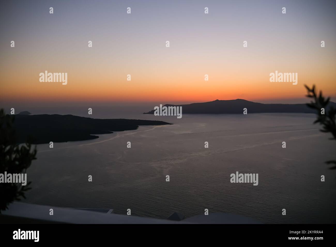 Spectacular sunset view from the rooftops of Fira Santorini Stock Photo ...