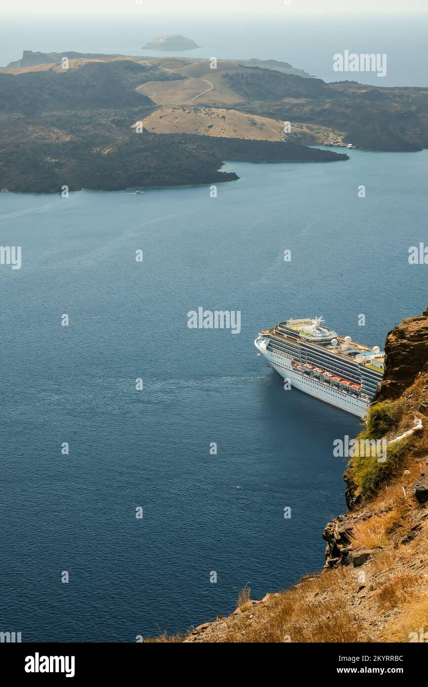Santorini, Greece - September 16, 2022 : View of a cruise liner next to ...