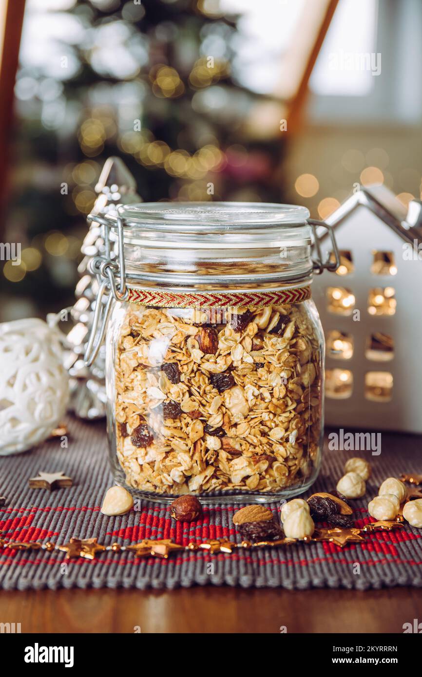 Concept of homemade Christmas present, handmade roasted granola with ...