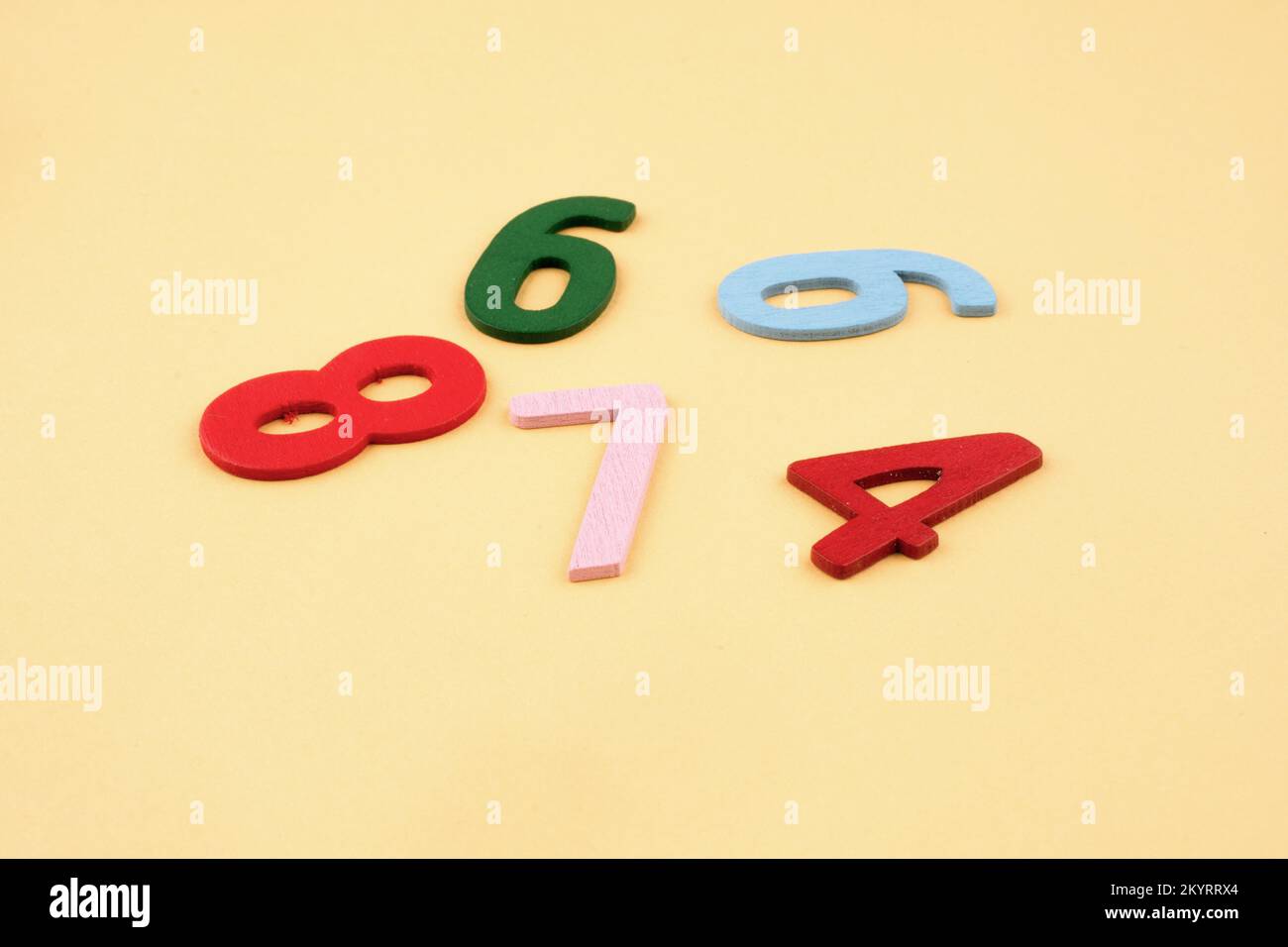Colorful numbers on a yellow background Stock Photo - Alamy