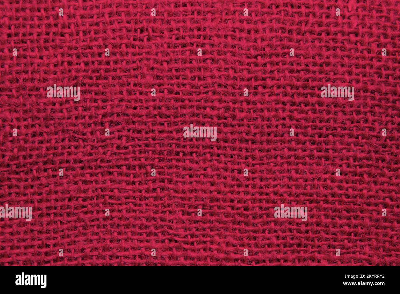Top view of sackcloth fabric for background. Close-up of viva magenta ...