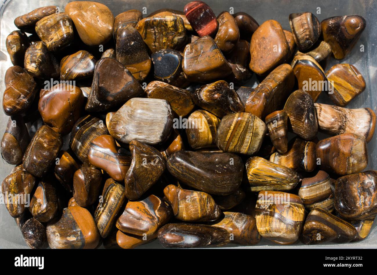 Tiger's eye and hawk's eye gemstone as natural mineral rock specimen ...