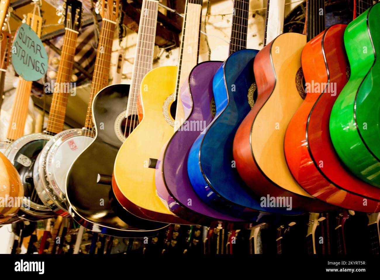 Set of Colorful classical guitar models in view Stock Photo - Alamy