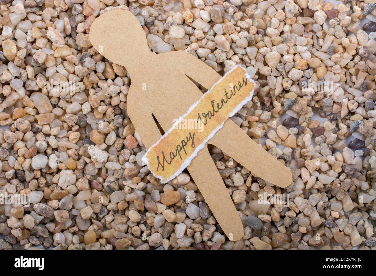 Valentine's day wording on torn paper as Love concept Stock Photo - Alamy