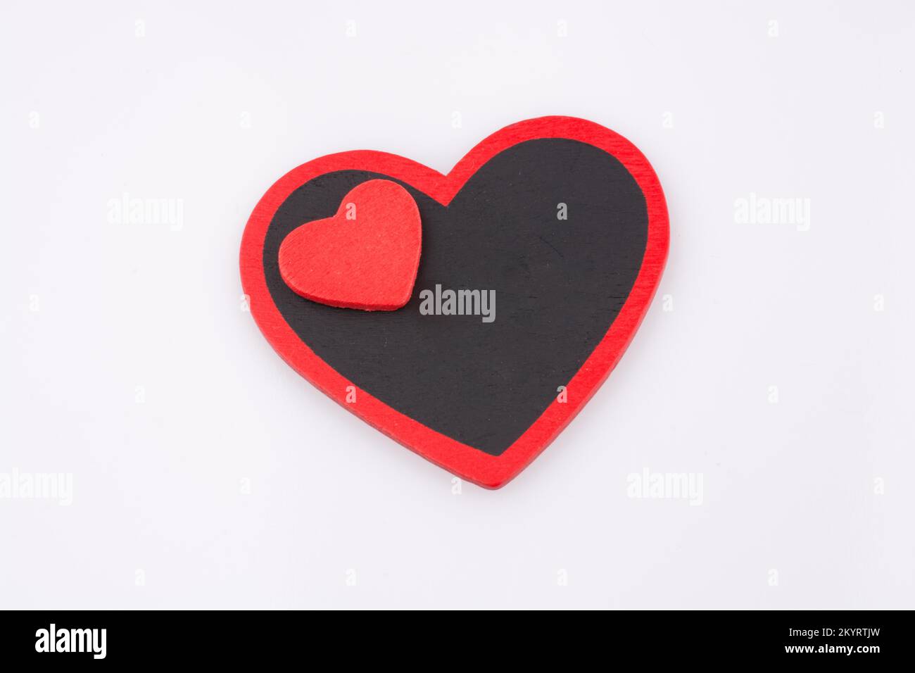 Heart inside a heart on a white background Stock Photo - Alamy