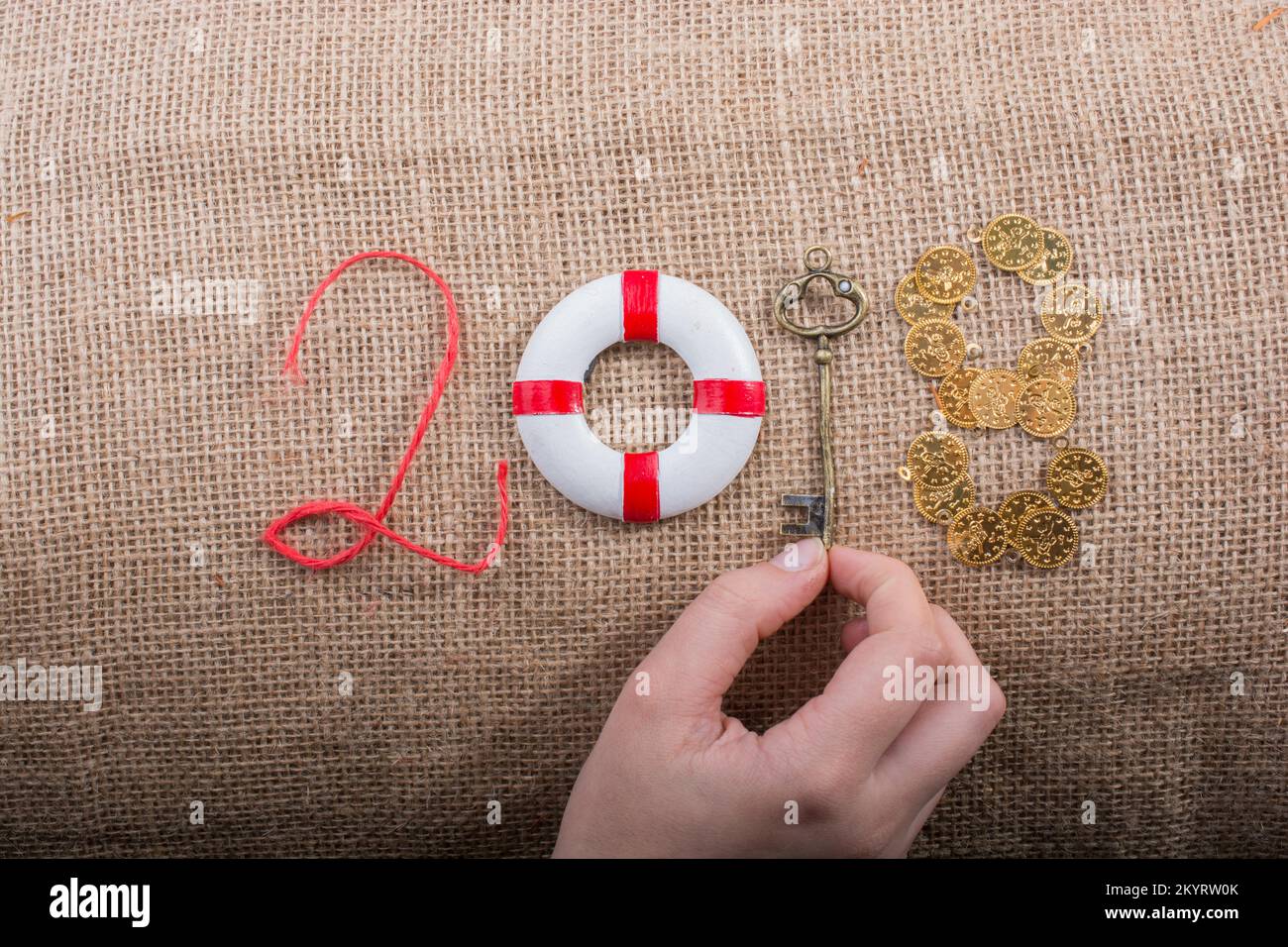 New Year 2018 decoration with life preserver, coins and a key Stock ...