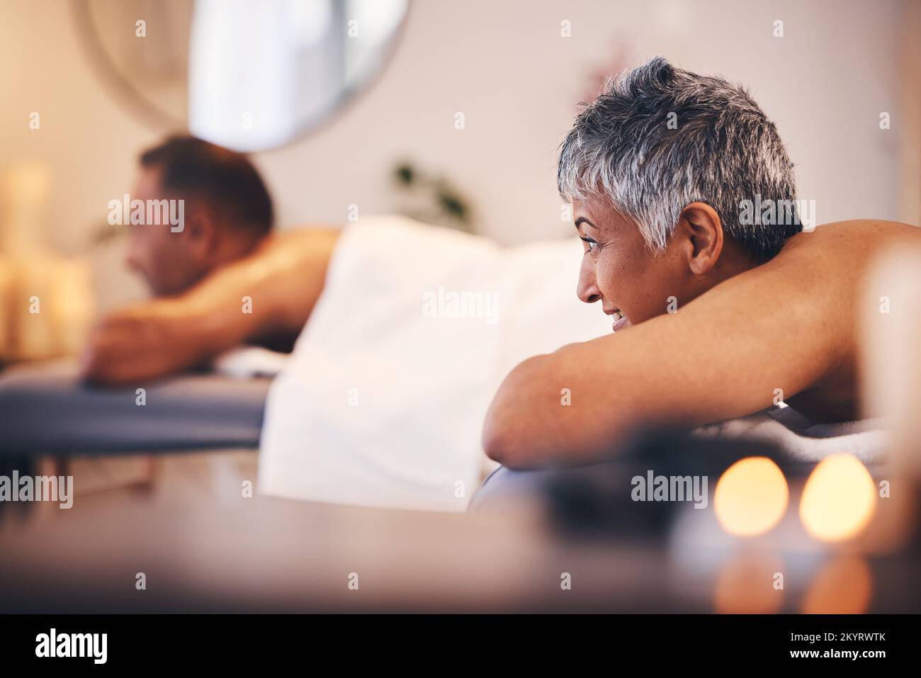 Senior woman, spa and man on massage bed with happiness, peace and ...