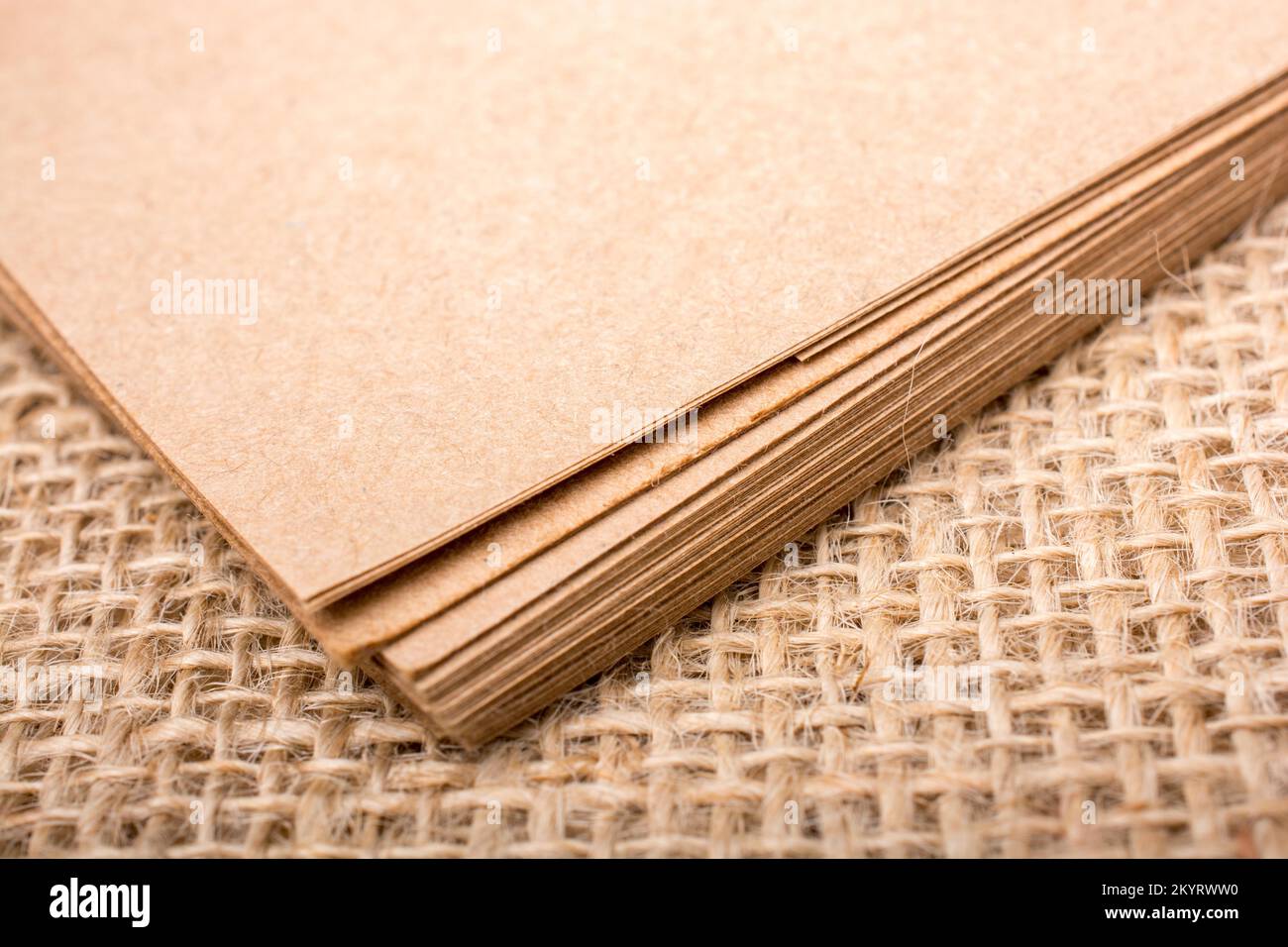 Brown color notebook placed on a canvas background Stock Photo - Alamy