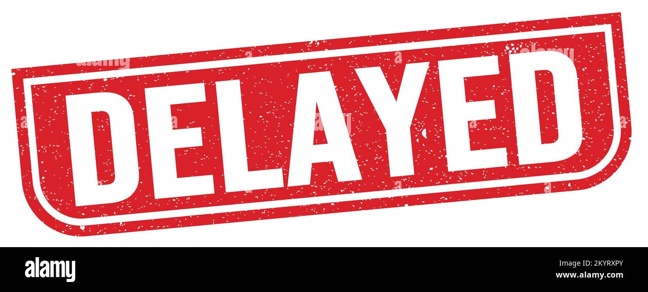 DELAYED text written on red grungy stamp sign Stock Photo - Alamy