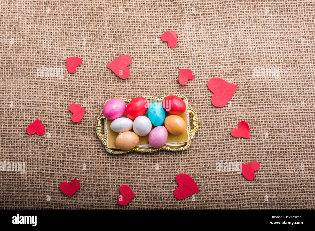 Paper heart and colorful candy sweets in tray Stock Photo - Alamy