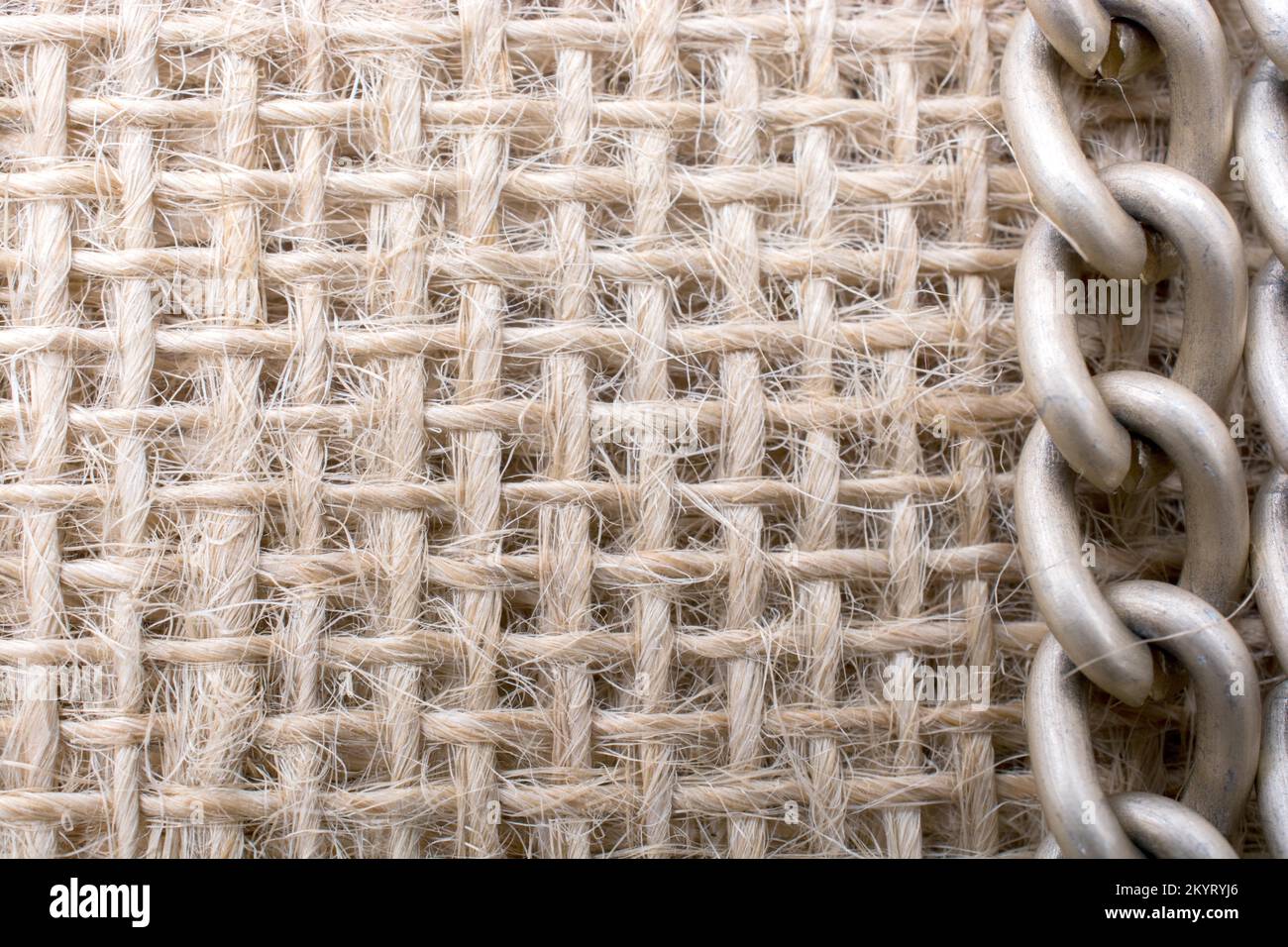 Chain on a linen canvas as a background texture Stock Photo - Alamy