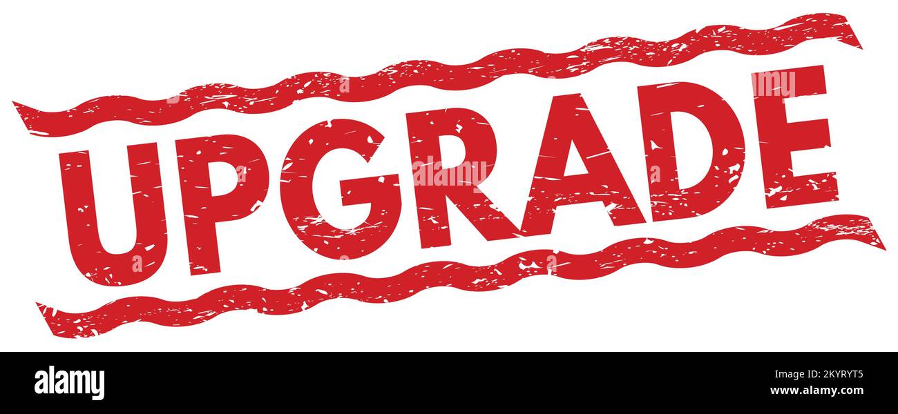 UPGRADE text written on red lines stamp sign Stock Photo - Alamy