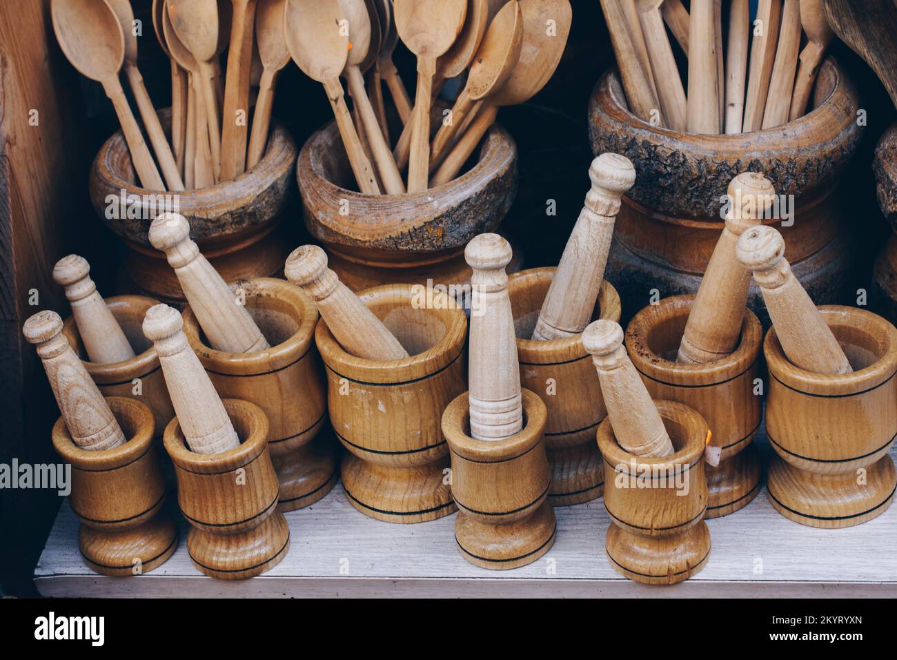 Wooden mortars and pestles as a traditional kitchenware Stock Photo - Alamy