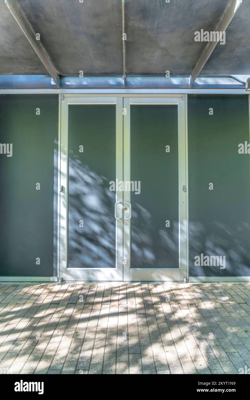 Tall double door with steel frames of a commercial building in Austin ...