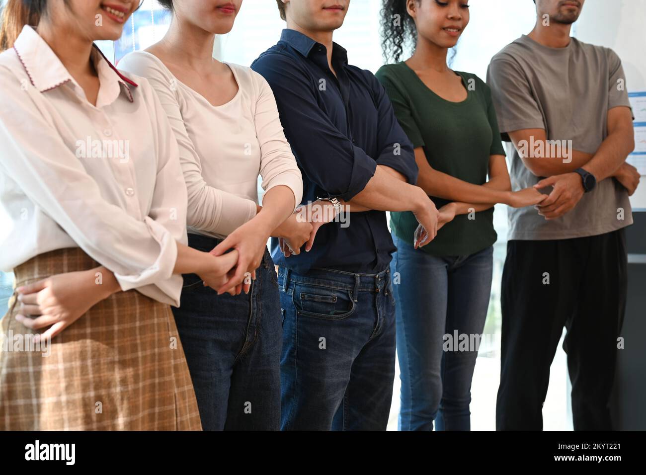 Group of successful start up business people standing in line and ...