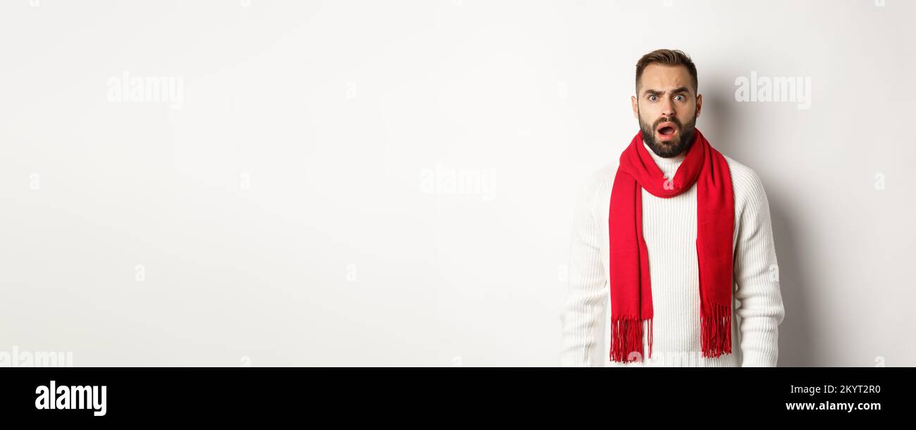 Christmas holidays and celebration concept. Confused bearded guy ...