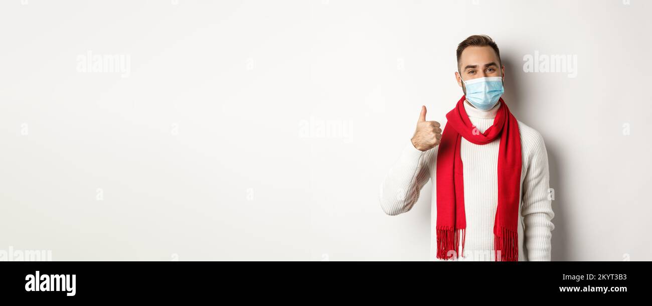 Covid-19, lockdown and quarantine concept. Satisfied smiling man in ...