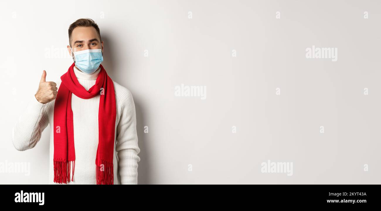 Covid-19, lockdown and quarantine concept. Satisfied smiling man in ...