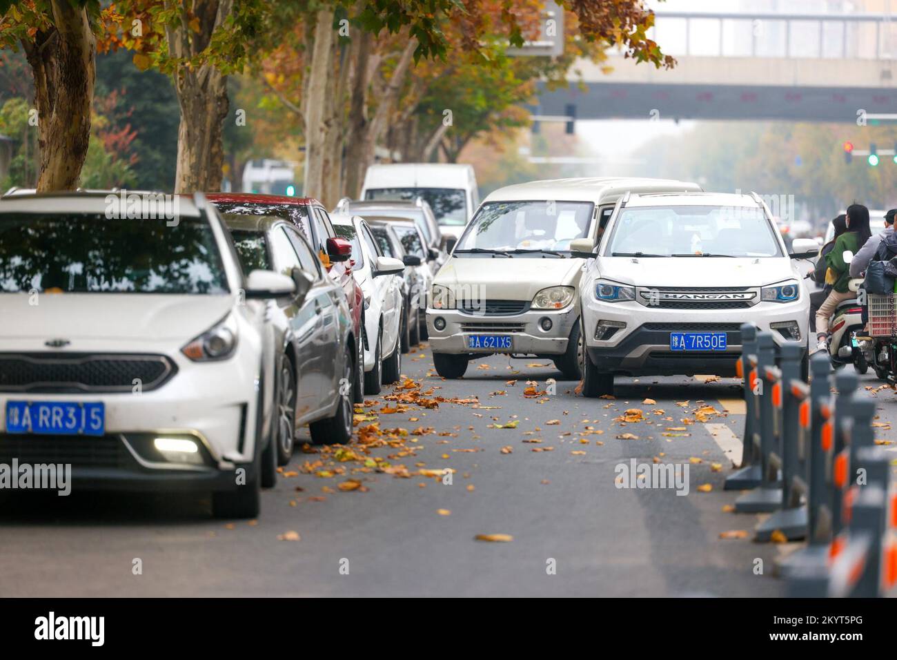 A new cold wave is coming and citizens go out with warm clothing in ...