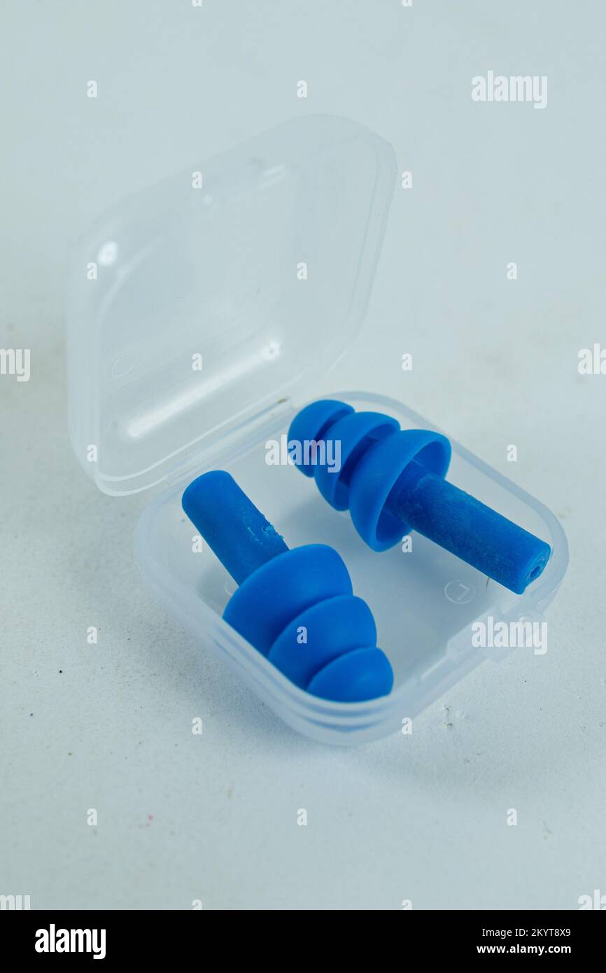 Silicone ear plugs for human ears on white background Stock Photo - Alamy
