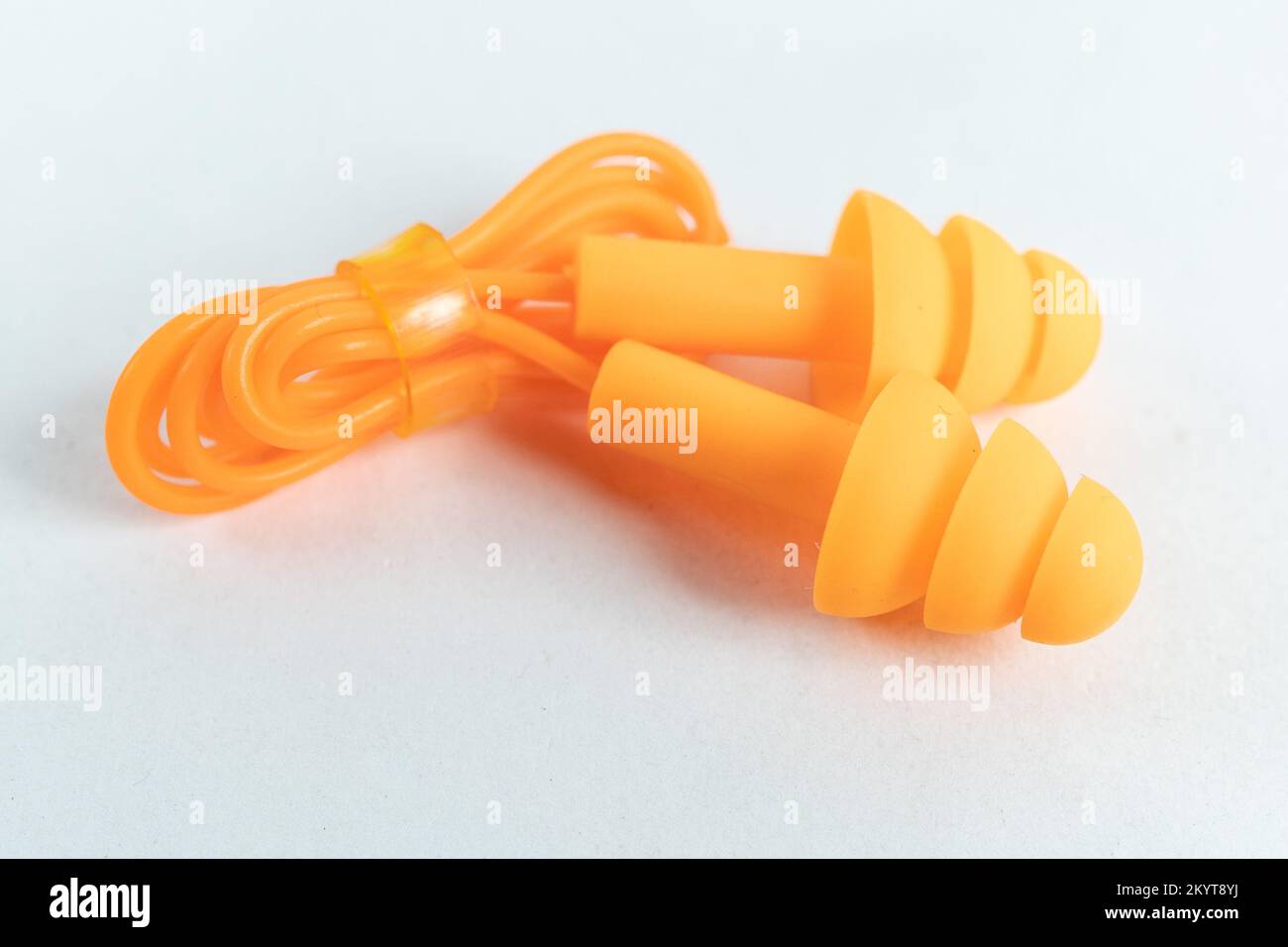 Silicone ear plugs for human ears on white background Stock Photo - Alamy