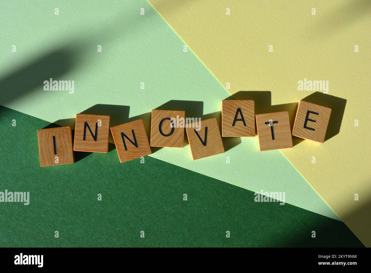 Innovate, word in wooden alphabet letters isolated on background Stock ...
