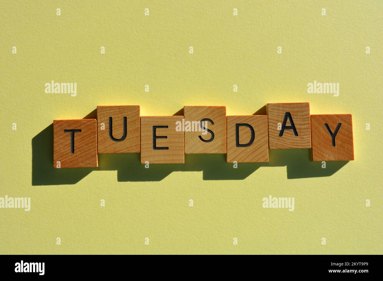 Tuesday, word in wooden alphabet letters isolated on background Stock ...