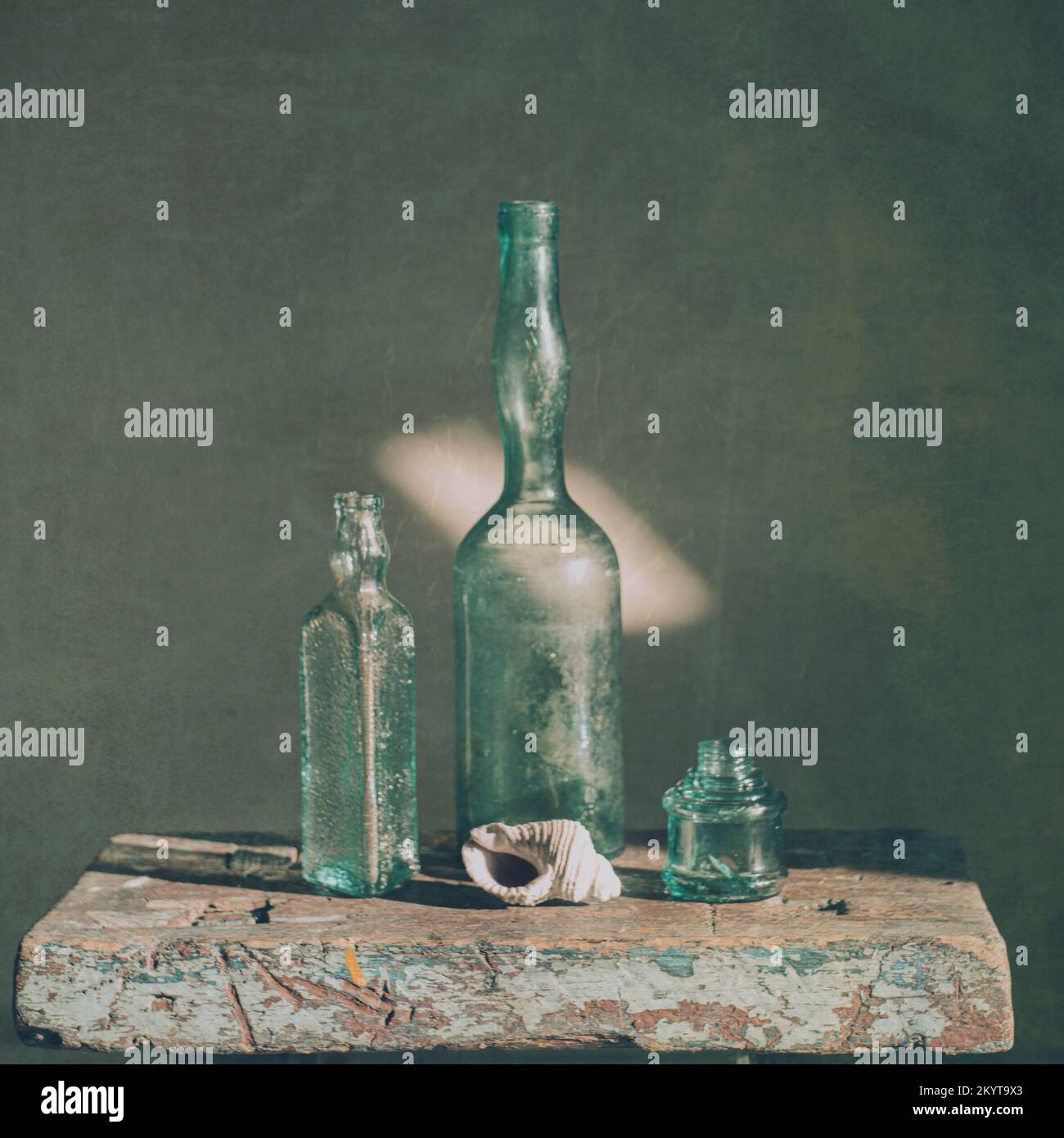 Still Life with differently shaped glass bottles. High quality photo ...