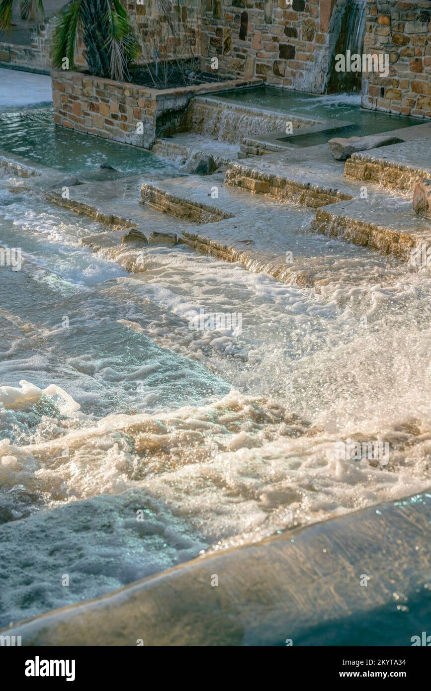 Beautiful water fountain with sunlit foamy water in San Antonio Texas ...