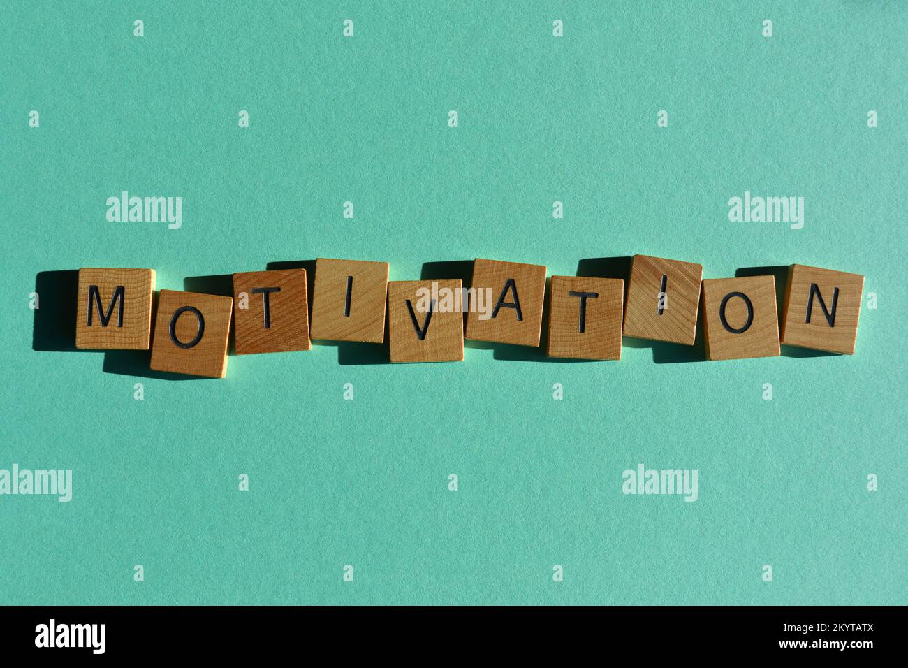 Motivation, word in wooden alphabet letters isolated on background ...