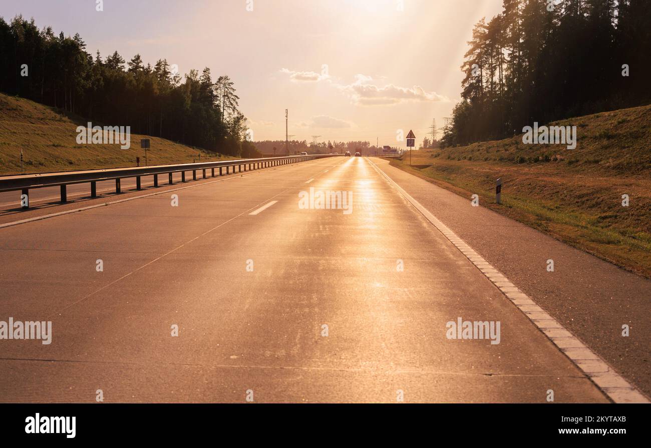 Highway wide road, transport and blue sky with clouds on a summer day ...