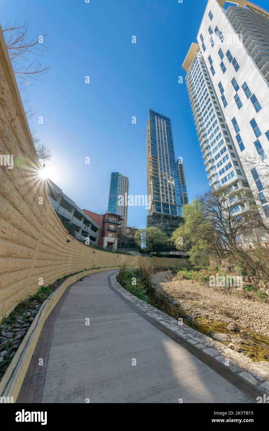 Bike path in Austin Texas with view of the city skyline against blue ...