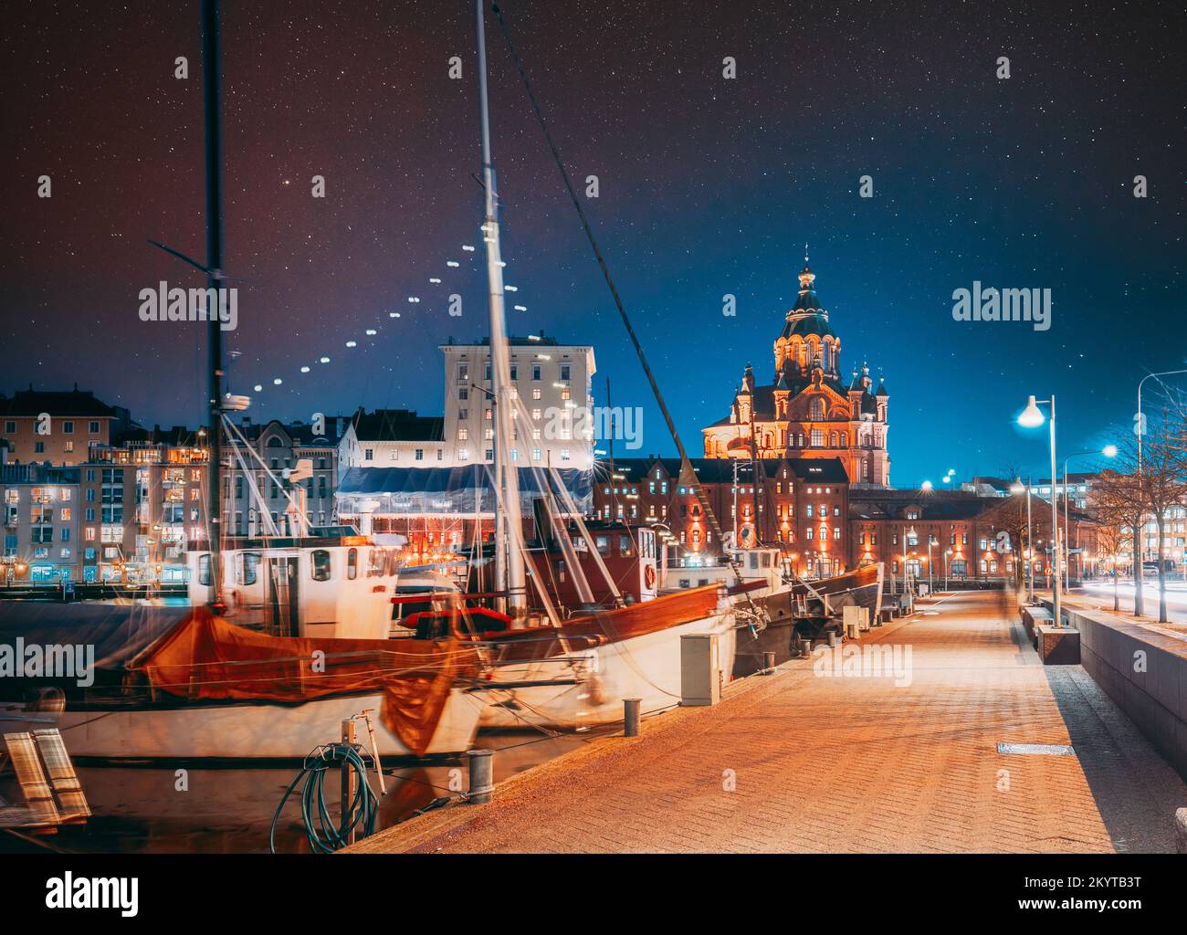 Helsinki, Finland. Bright Blue Starry Sky Above Pier With Boats ...