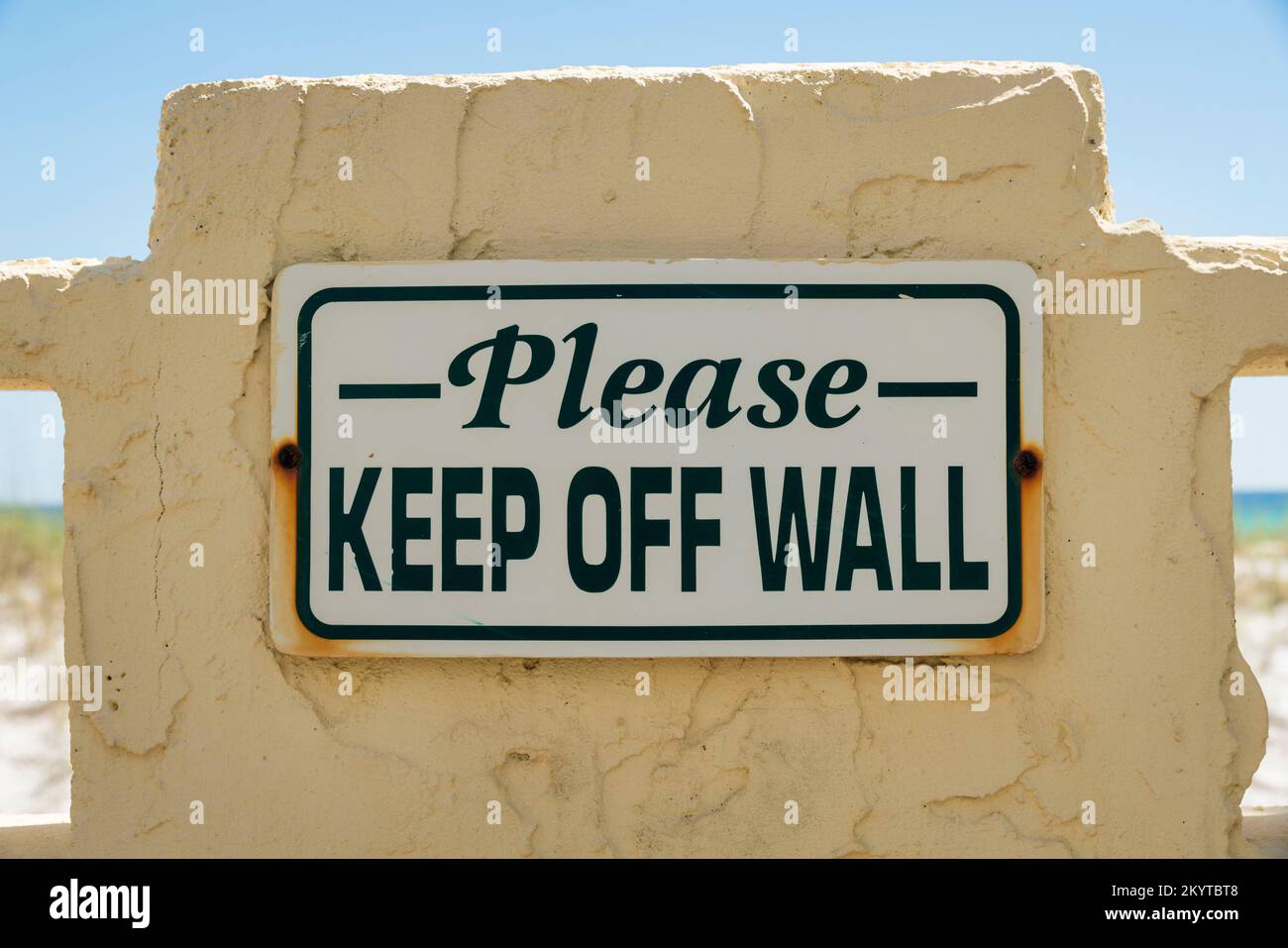 Please Keep Off Wall sign against white textured wall in Destin Florida ... Please Keep Off Wall sign against white textured wall in Destin Florida ...