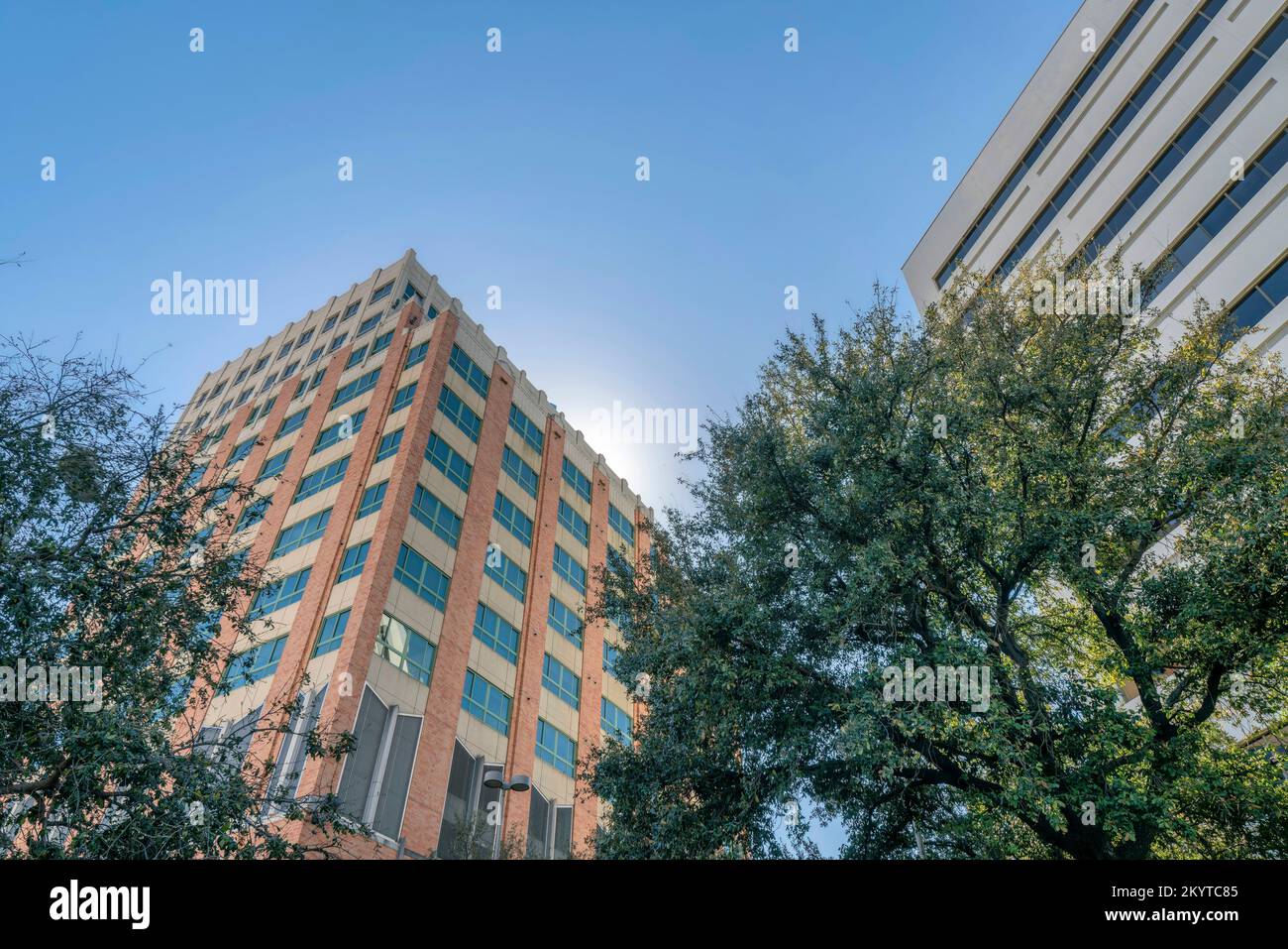 San Antonio, Texas- View of two buildings from below at River Walk ...