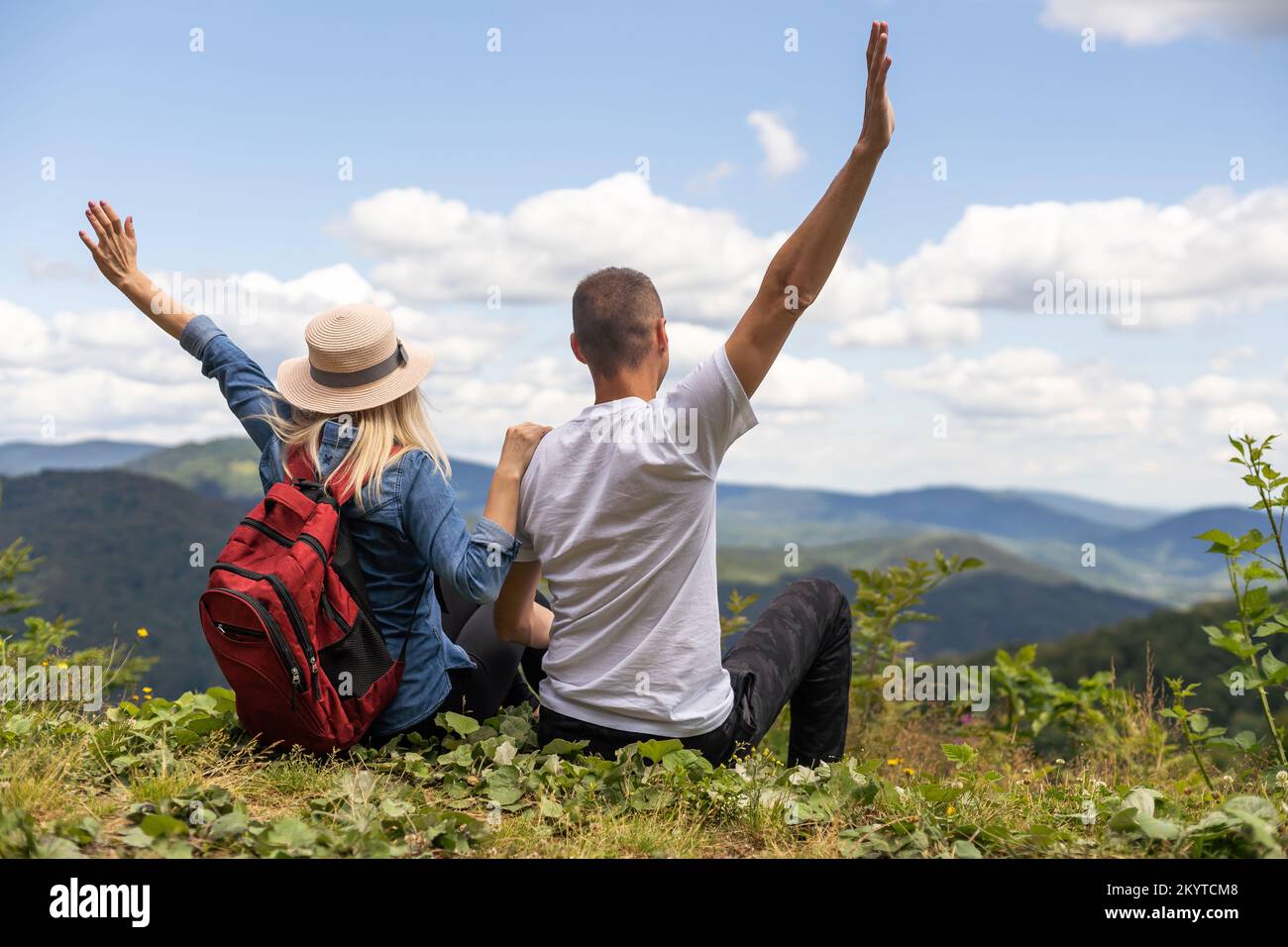 beautiful young couple enjoying nature at mountain Stock Photo - Alamy