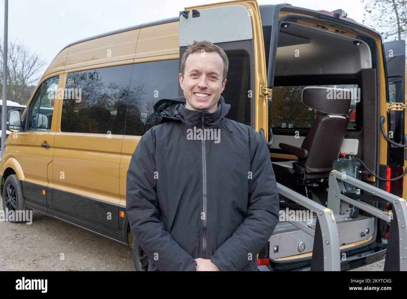 Hamburg, Germany. 02nd Dec, 2022. Sascha Meyer, CEO of MOIA, stands in front of a Moia bus with ...
