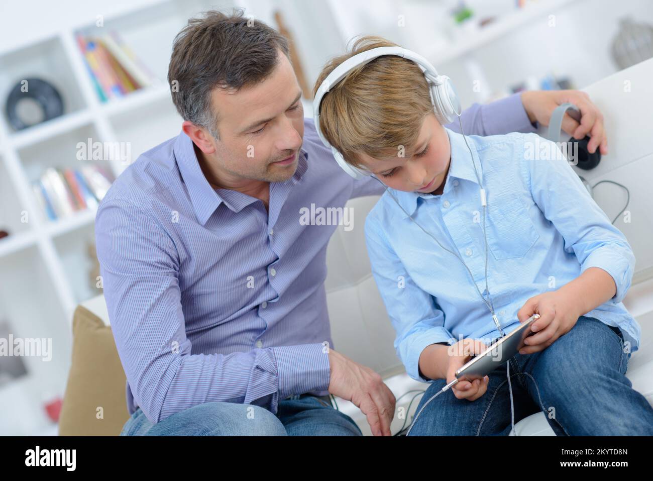 a young boy with a headset Stock Photo - Alamy