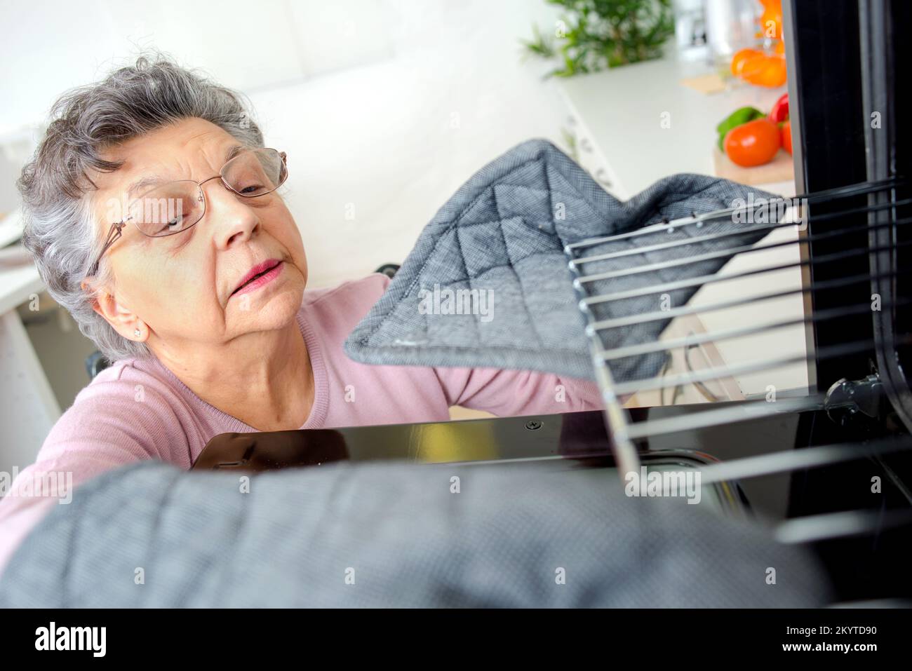 Old lady baking hi-res stock photography and images - Alamy