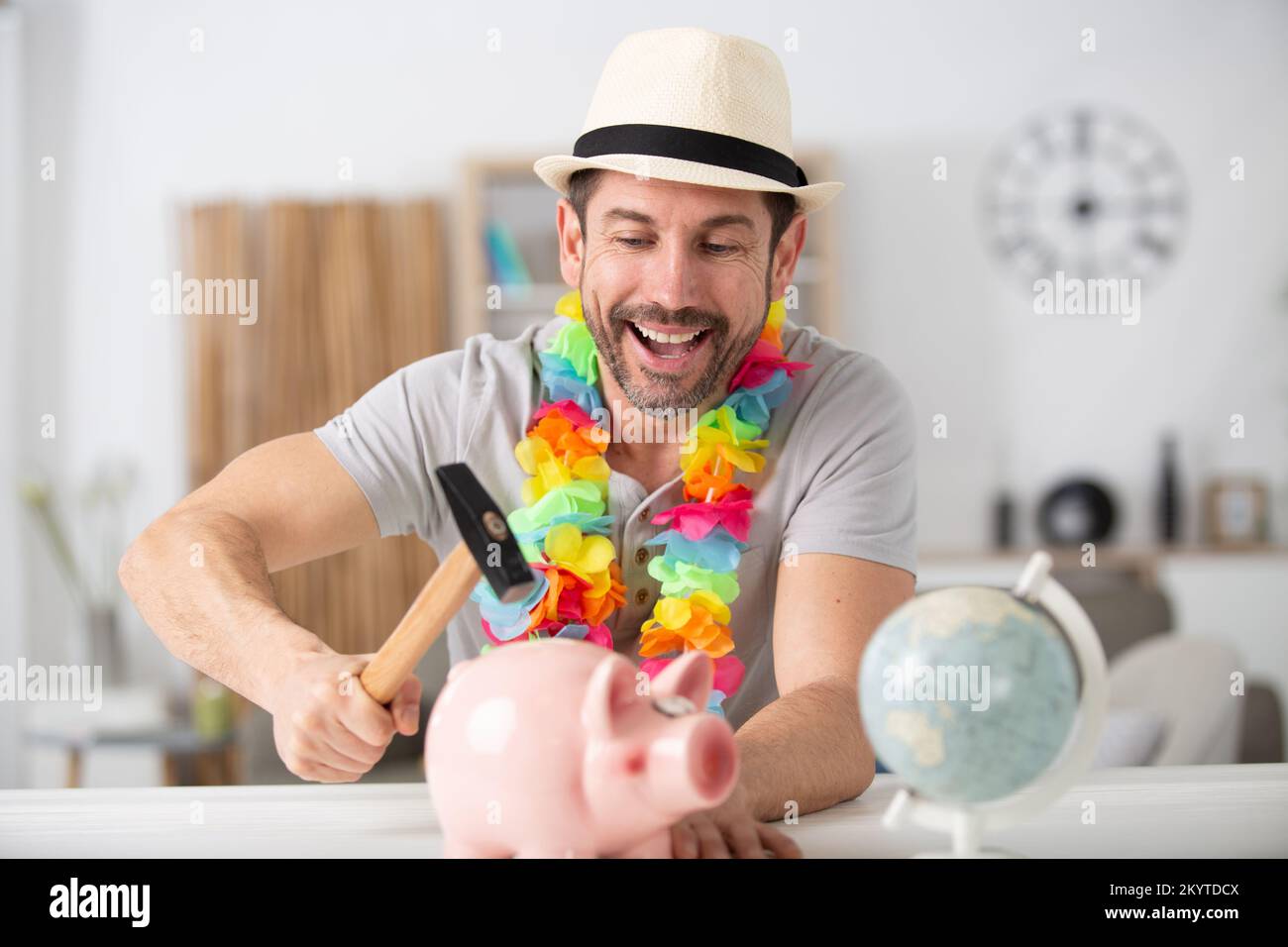 Man breaking bank hammer hi-res stock photography and images - Alamy