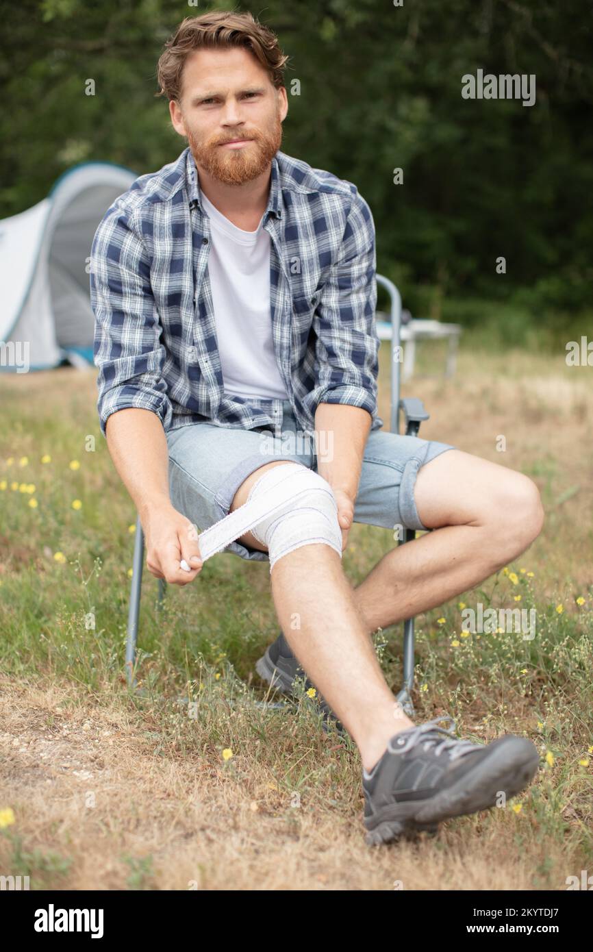 Man camping accident hi-res stock photography and images - Alamy
