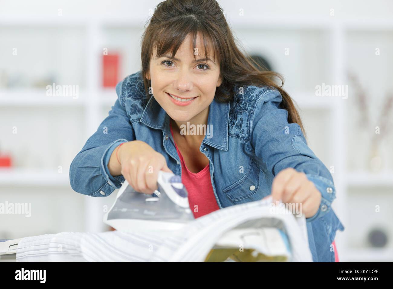 happy woman housewife successful finish the ironing clothes Stock Photo ...