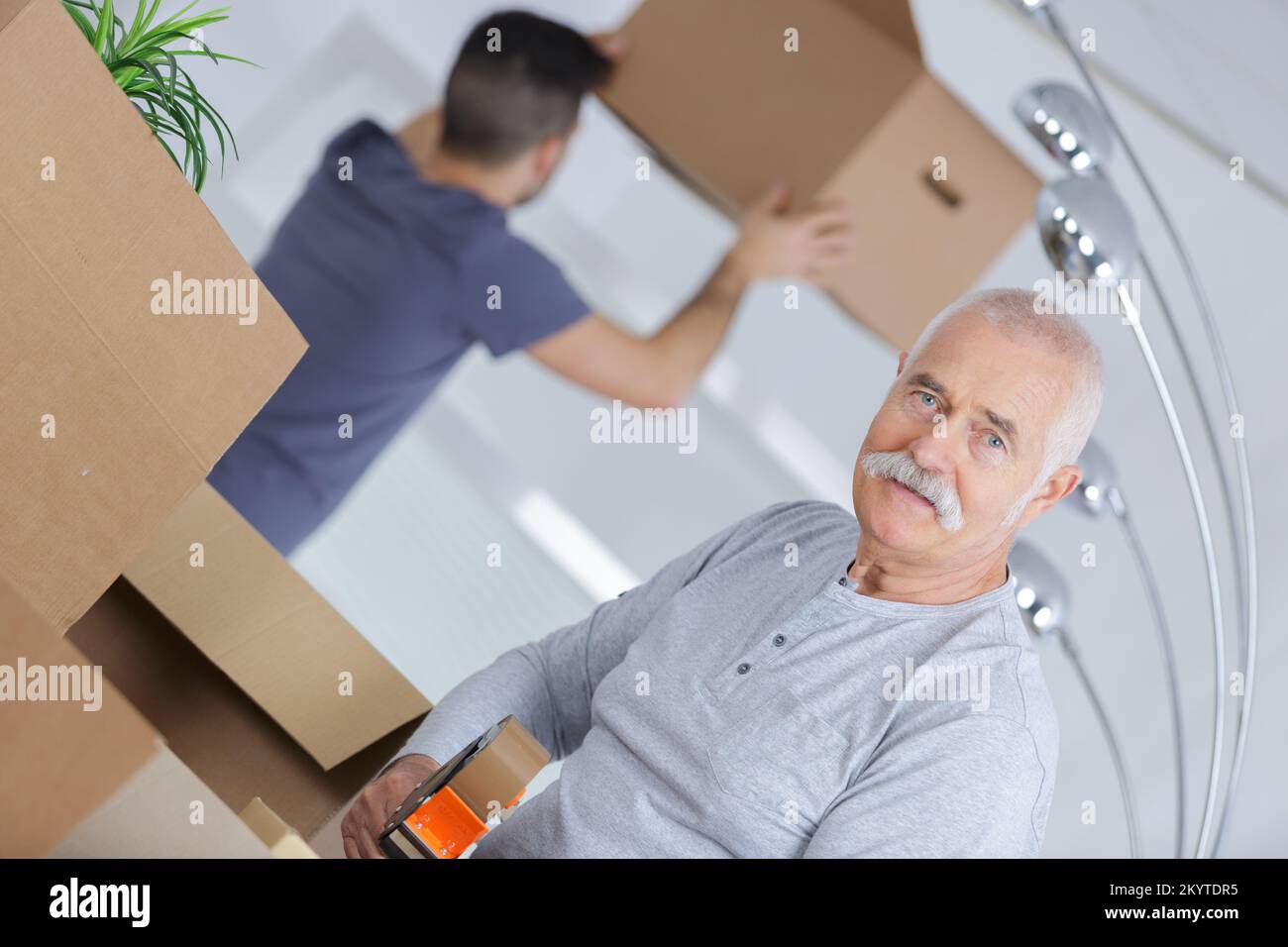 Father son preparing box hi-res stock photography and images - Alamy