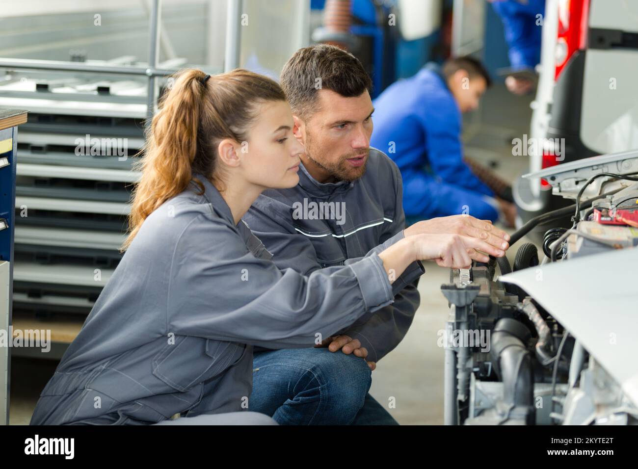 portrait of two modern mechanics Stock Photo - Alamy
