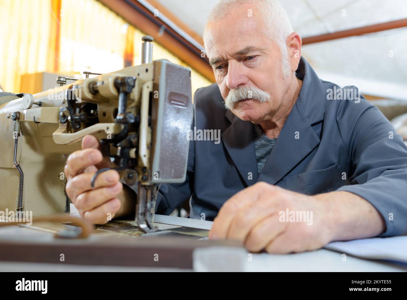 senior using a sewing machine Stock Photo - Alamy